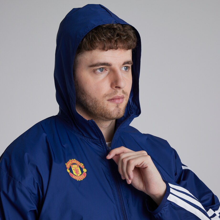 Manchester United x adidas Essentials 3-Stripes Windbreaker Blue 구매 ... Manchester United x adidas Essentials 3-Stripes Windbreaker Blue 구매 ...