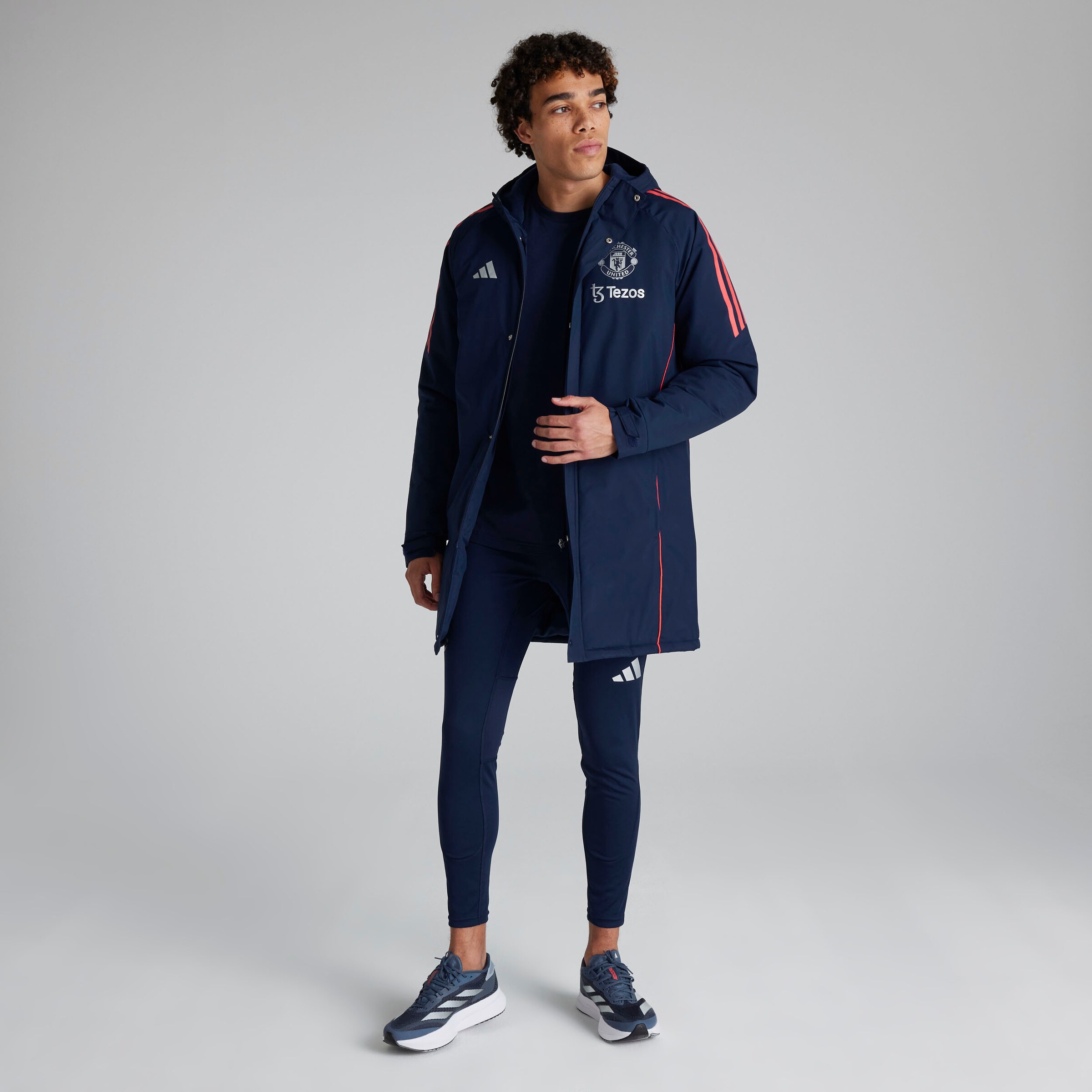 Buy Manchester United Tiro 24 Stadium Parka Navy | Manchester United Store